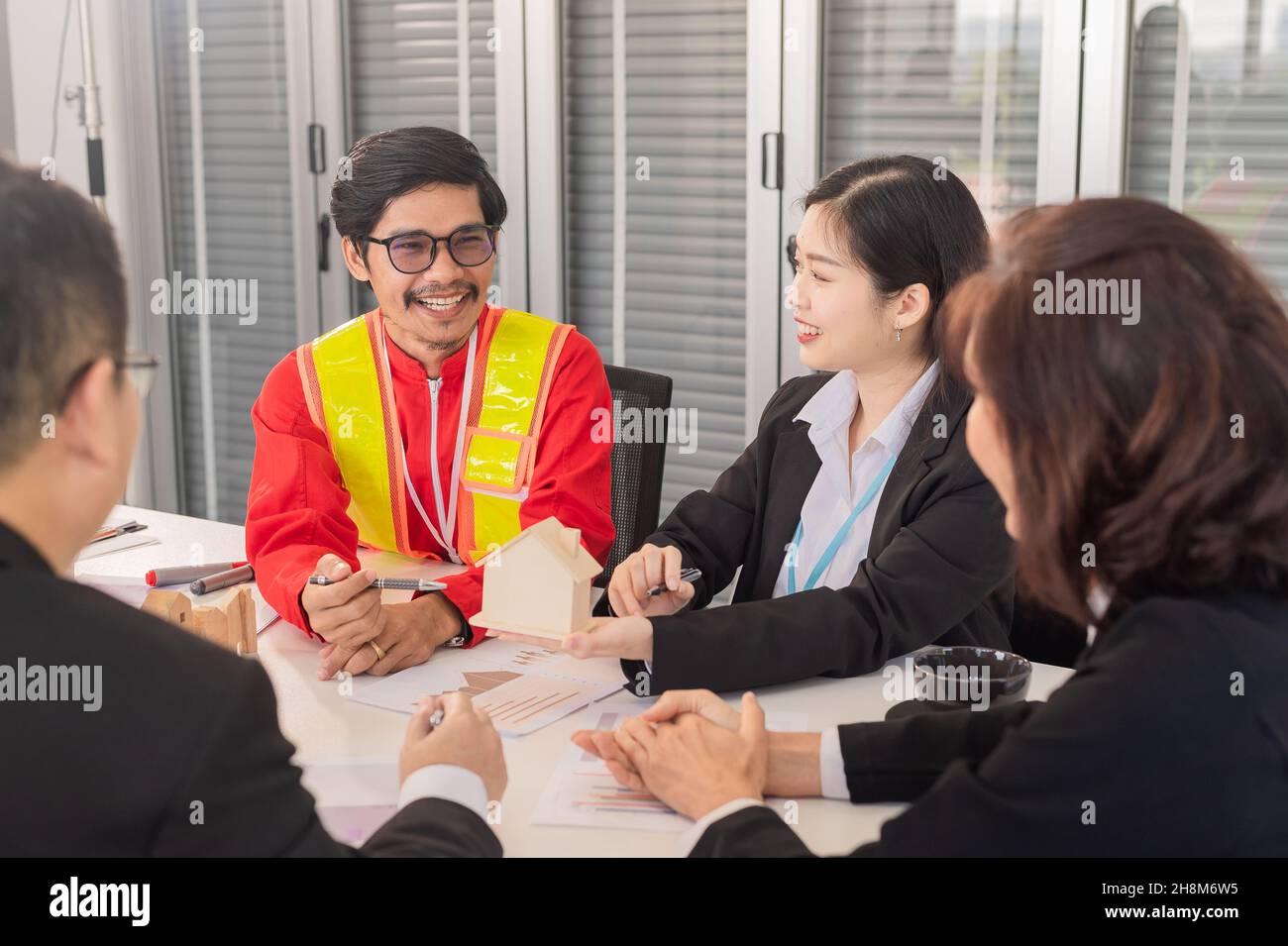 Happy people business team talking discussion construction project ...