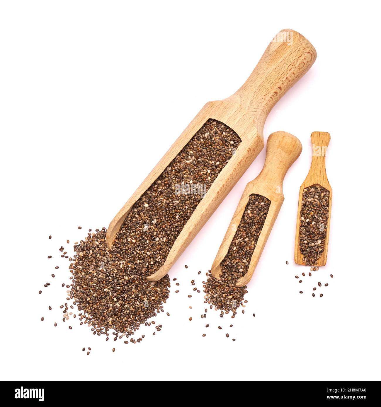 Wooden scoop of organic natural chia seeds close-up isolated on white ...