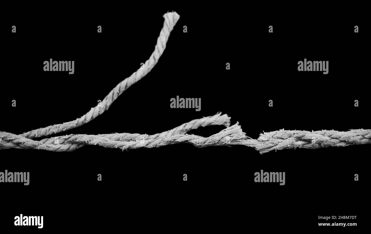 Rope breaking process isolated on black background, liberation concept ...