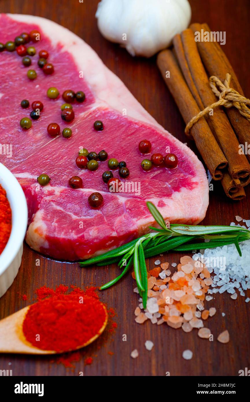 raw uncooked ribeye beef steak butcher selection Stock Photo - Alamy
