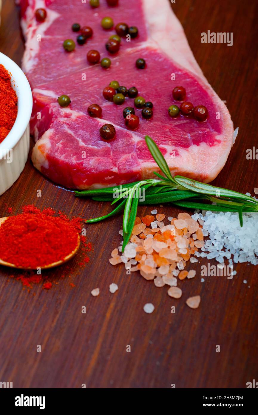 raw uncooked ribeye beef steak butcher selection Stock Photo - Alamy