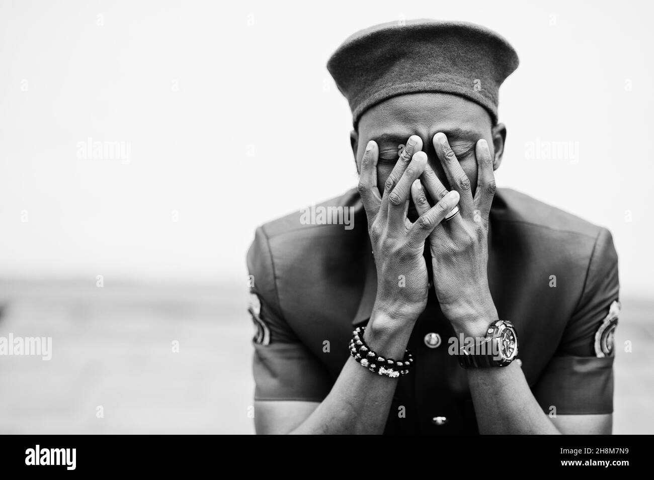 Pain of war. Portrait of African American military man in red uniform ...