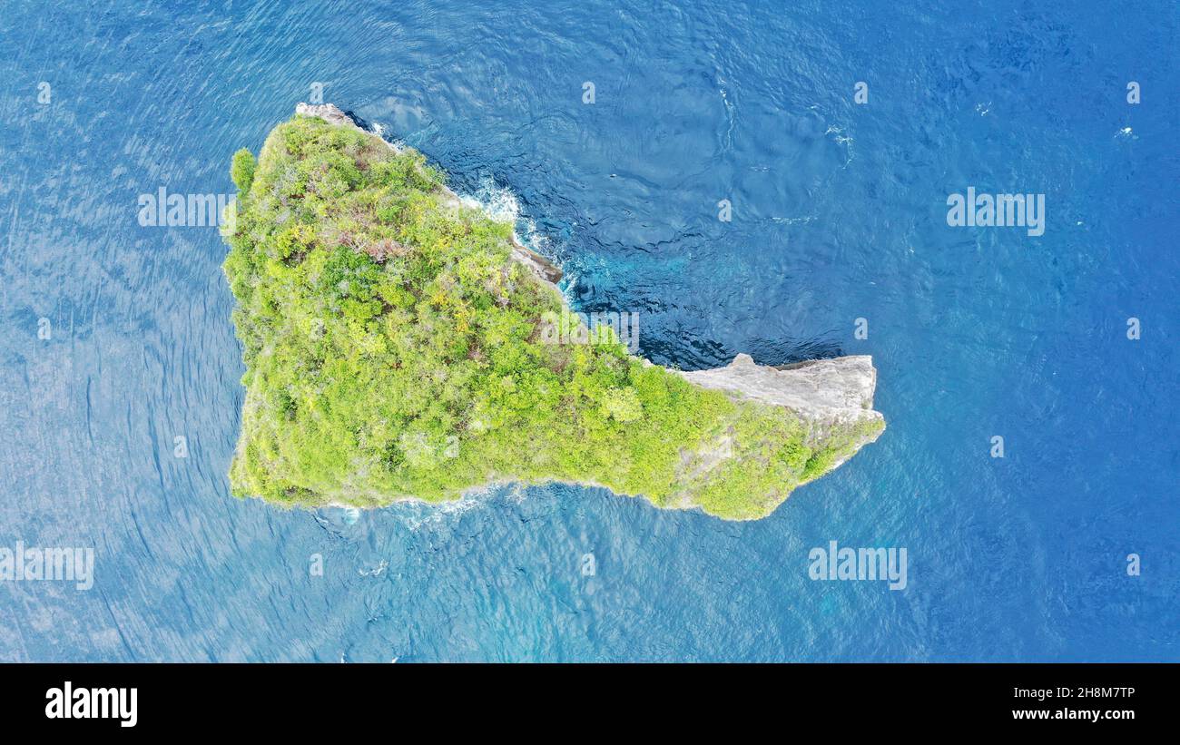 Rocky islet in the Indian oceanOcean. Aerial footage of isolated island ...