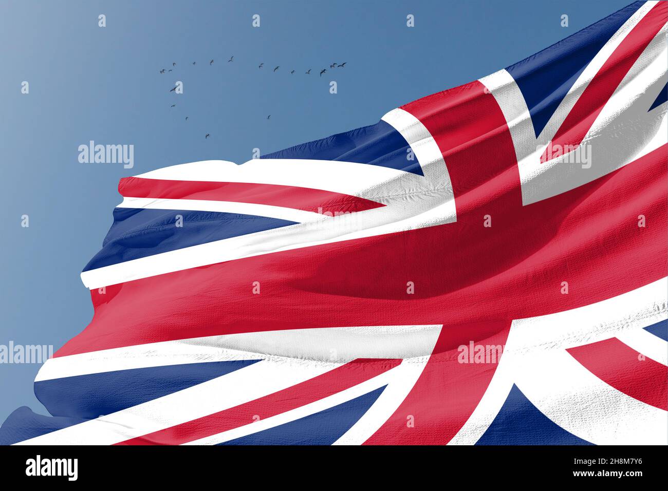 union jack flag on blue sky Stock Photo - Alamy