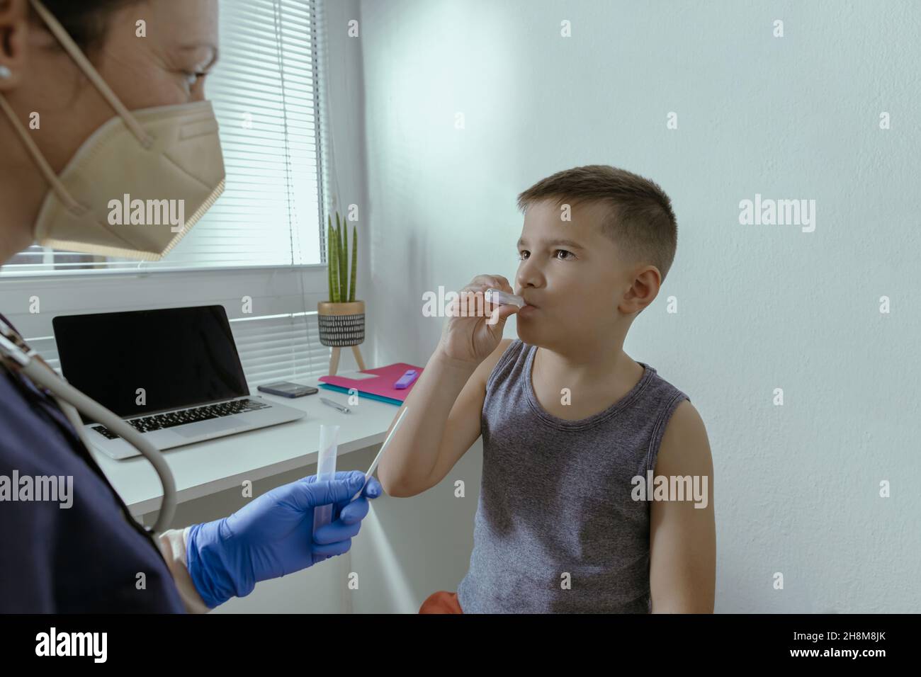 Child Having Saline Gargle PCR Test Performed at Doctor Office. Female ...