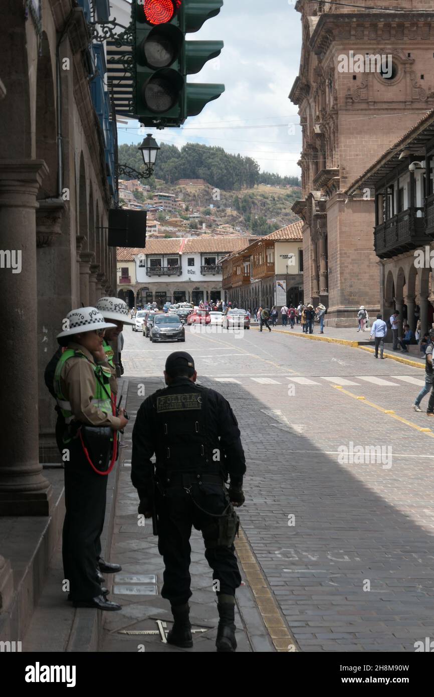 Peru police in street Cusco military soldiers soldier hat hats helmet ...