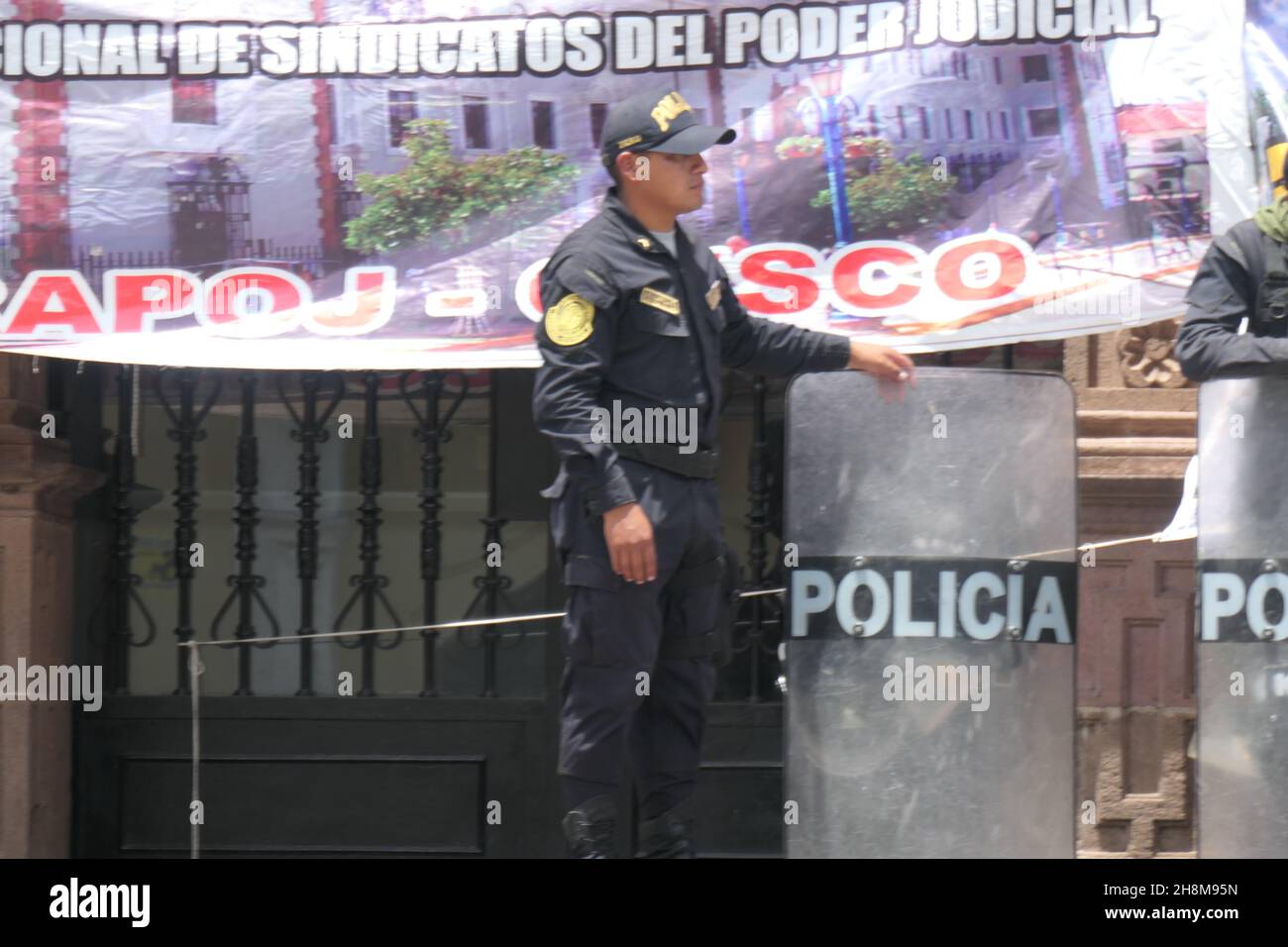 Peru riot police with shields in street at Carnival Cusco riot police ...