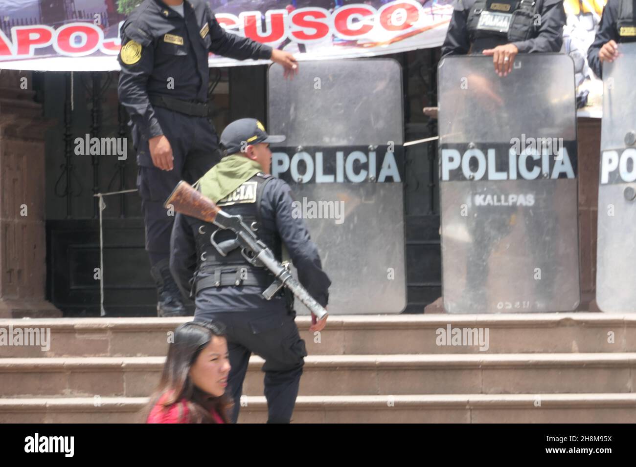 Peru riot police with shields and gun in street at Carnival Cusco shot ...