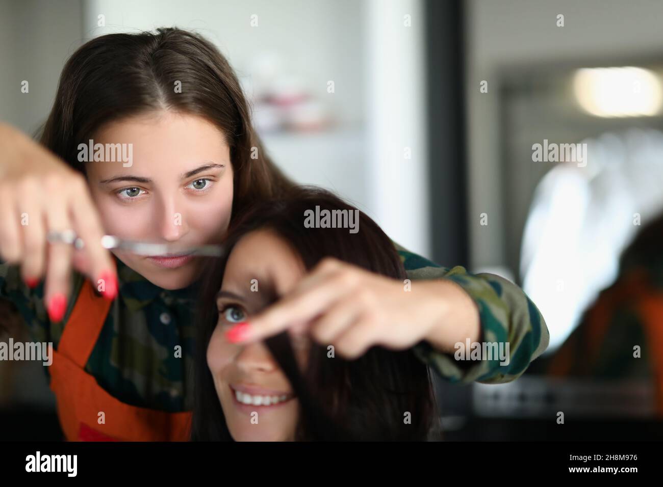 Woman hair holding lock hi-res stock photography and images - Alamy