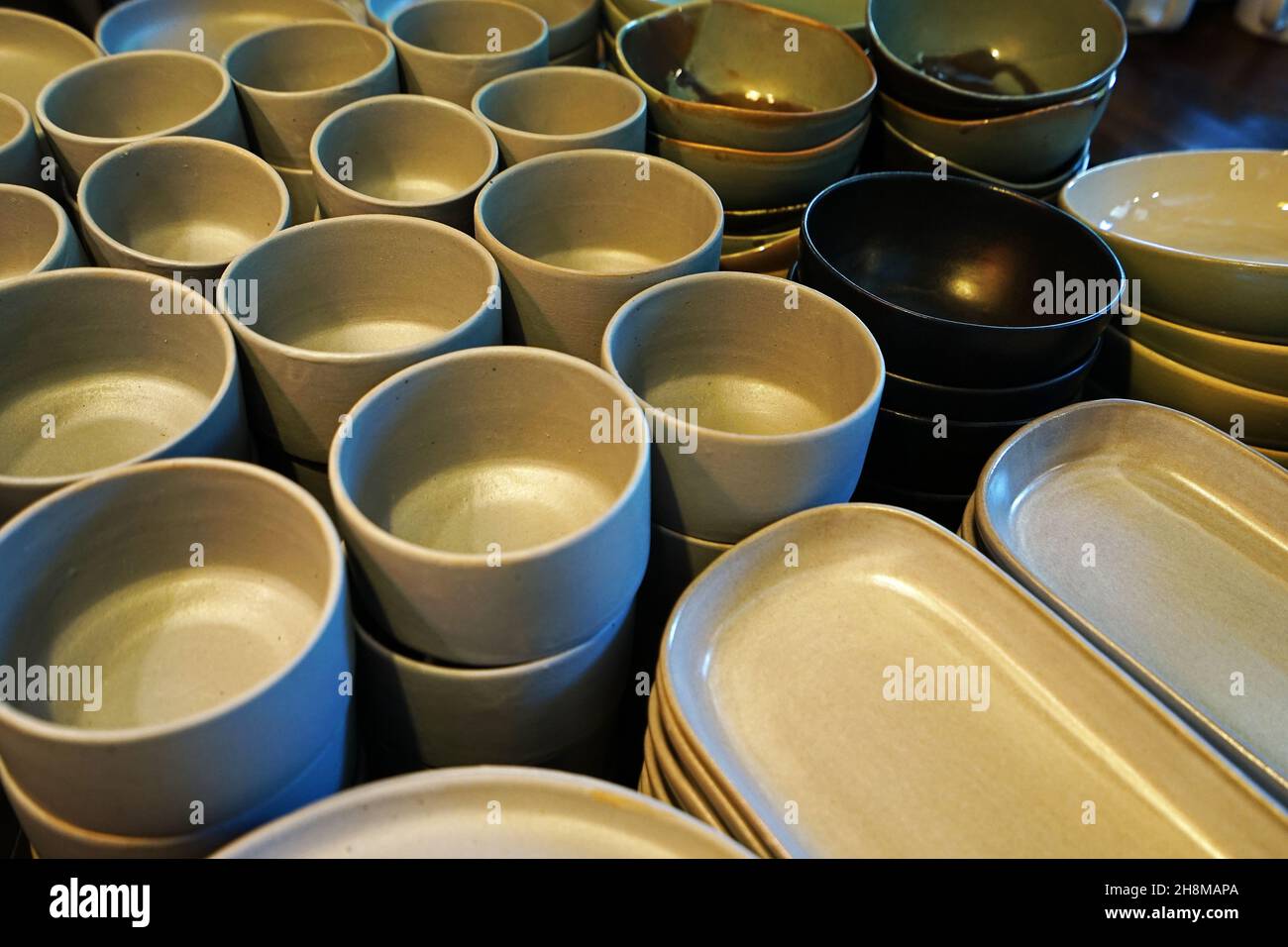 Stacks of ceramic porcelain container Stock Photo - Alamy