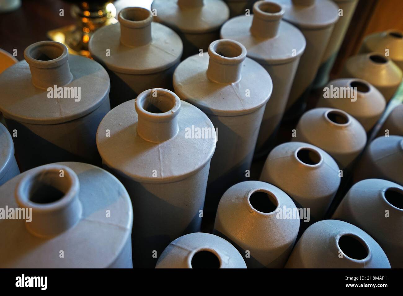Stacks of ceramic porcelain container Stock Photo - Alamy