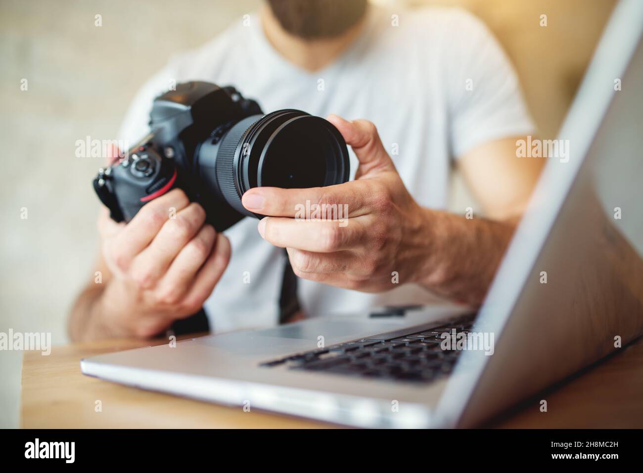 Adjusting settings on camera hi-res stock photography and images - Alamy