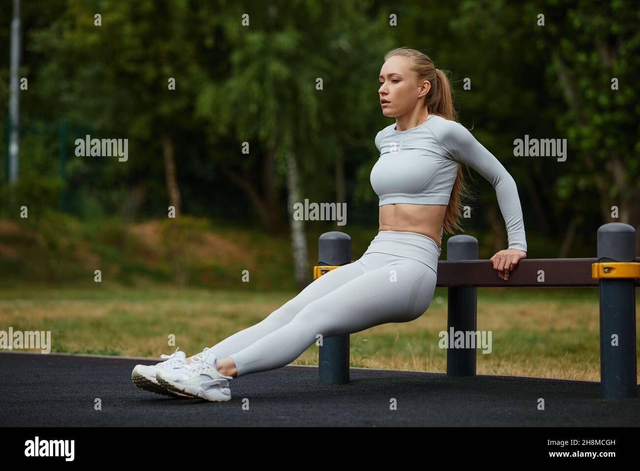 Woman exercise outside dips hi-res stock photography and images - Alamy