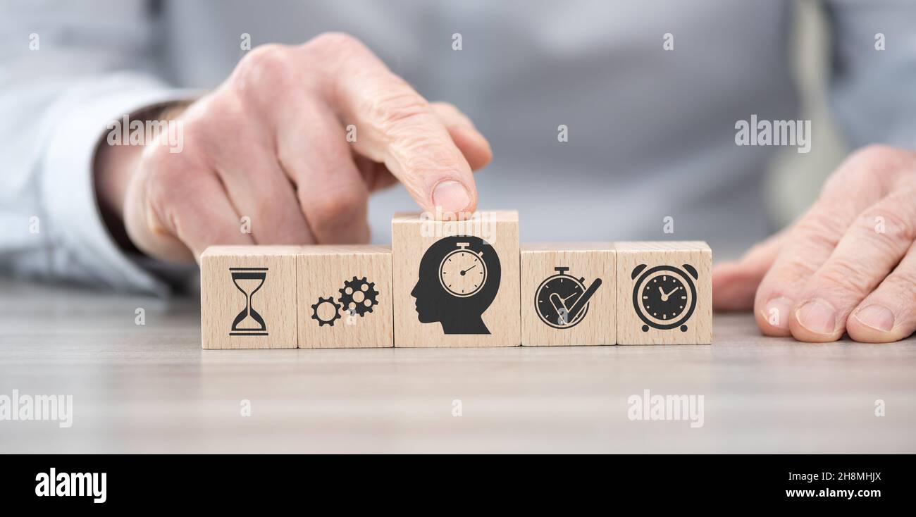 Wooden blocks with symbol of time management concept Stock Photo - Alamy