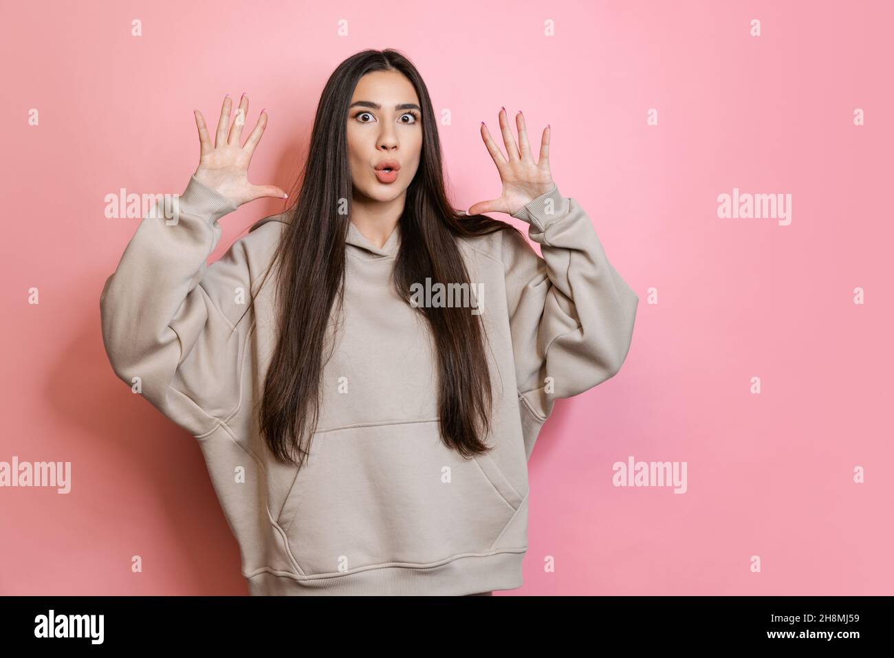 Cropped portrait of young beautiful girl with expressive fasial ...