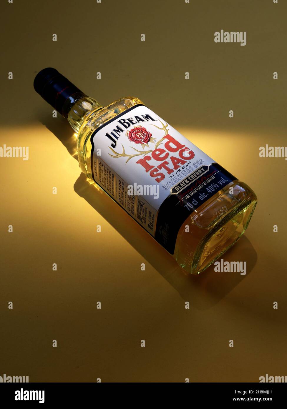 Jim Beam Red Stag Liqueur, Bourbon Whiskey against a yellow background ...