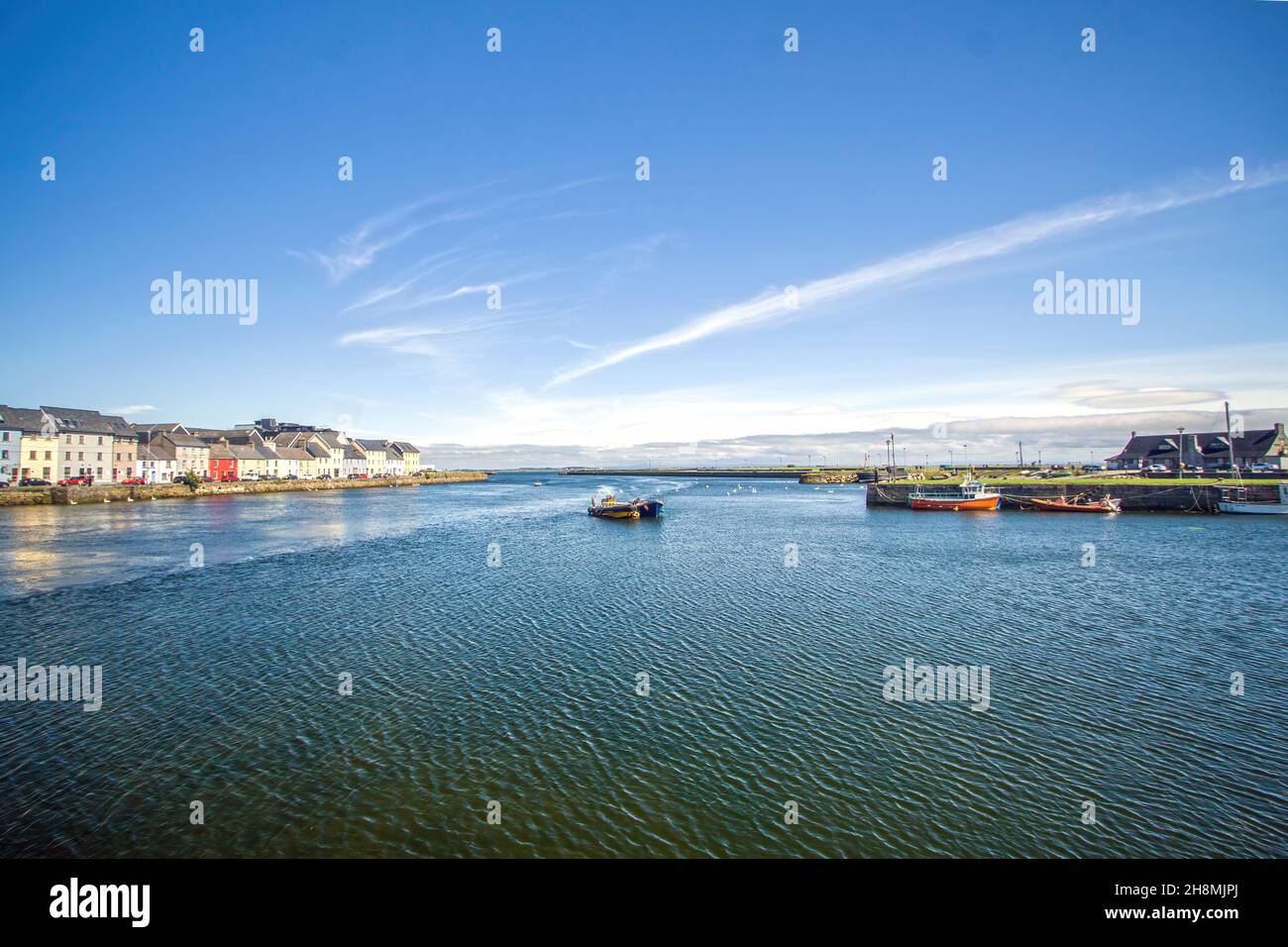 Galway seaport in sunny day, view on the old docks, boats and ships in ...
