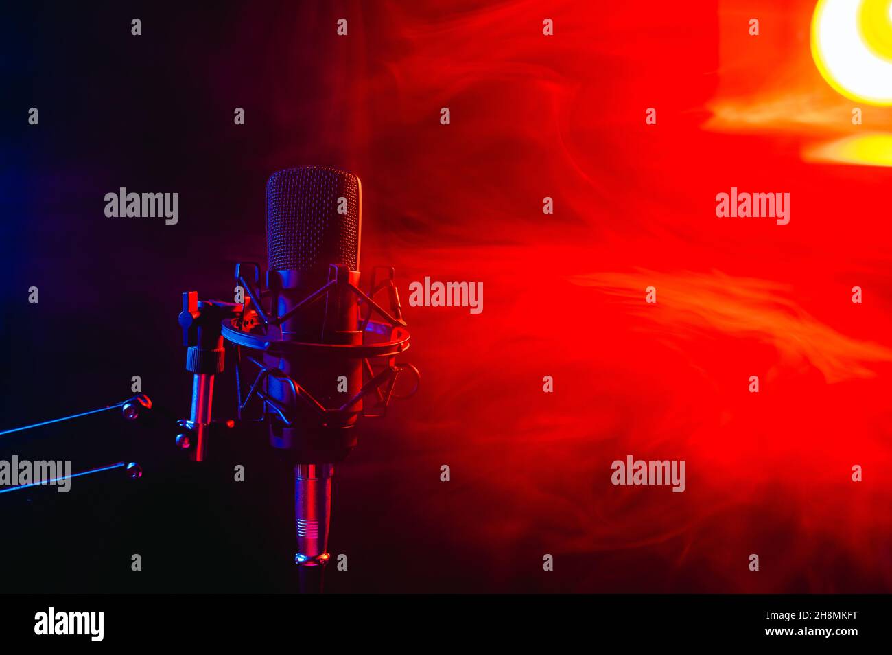 Professional microphone in red smoke on a black background Stock Photo ...
