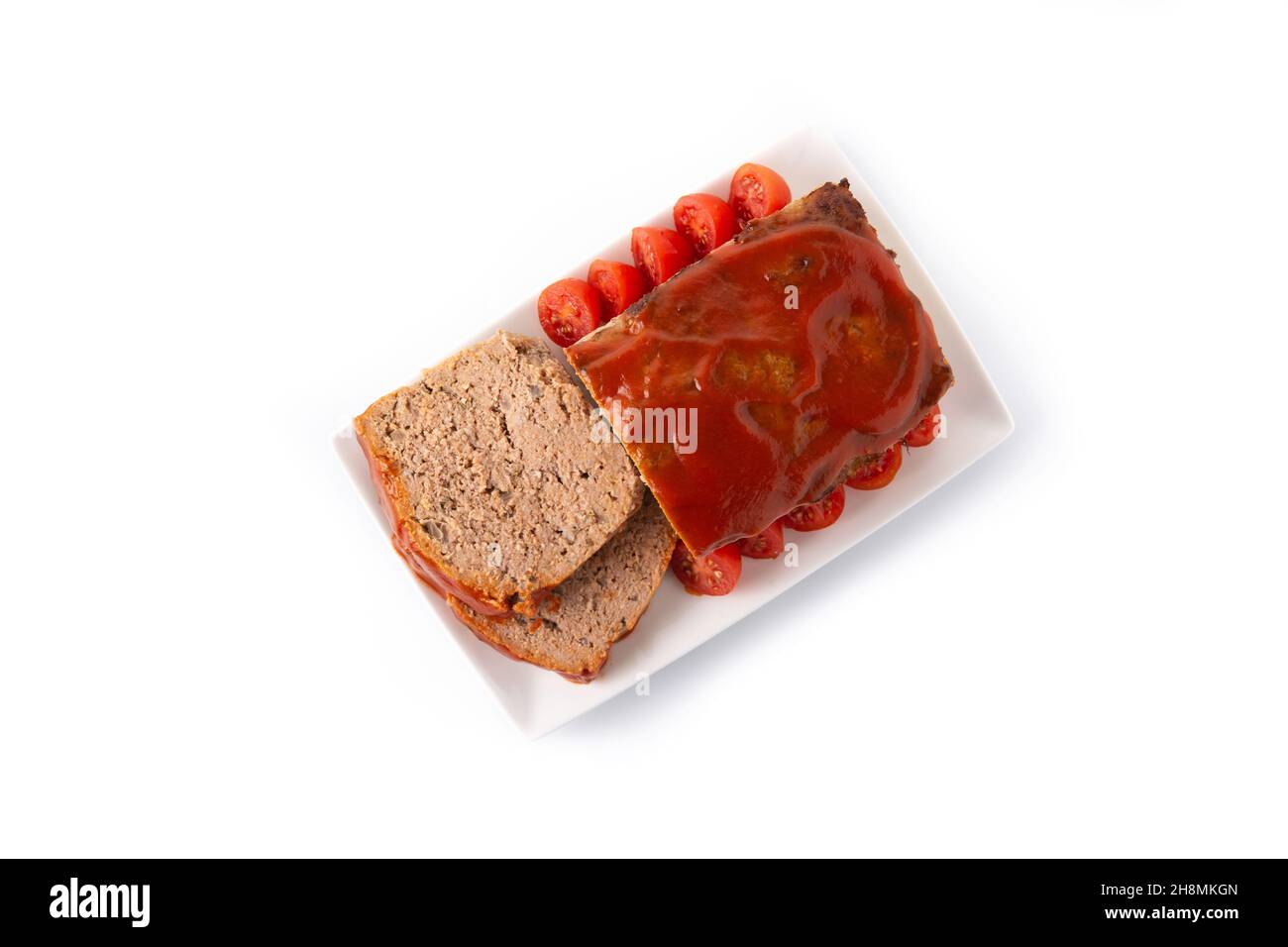 Traditional American meatloaf with ketchup isolated on white background ...