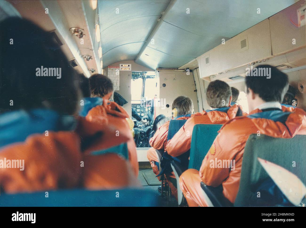 Men wearing survival suits on onboard a Sikorsky S61 Helicopter ...