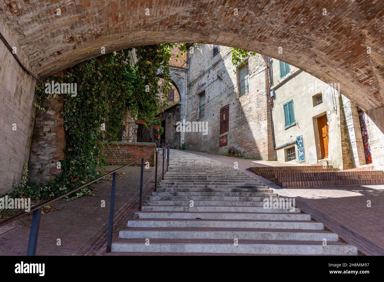 Medieval street in Perugia historic center, Umbria, Italy Stock Photo ...