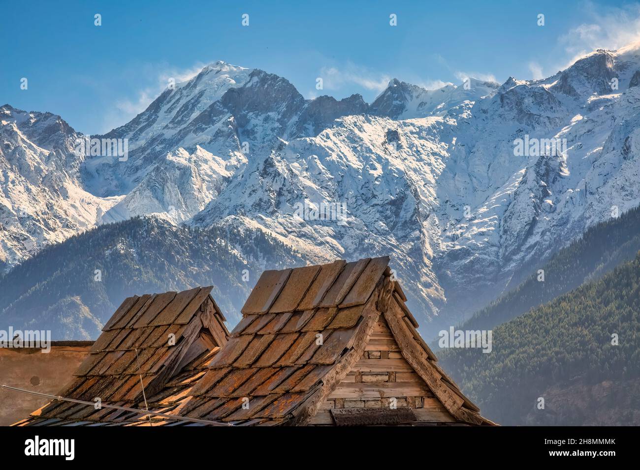 Village house on the mountain slopes with scenic Himalaya landscape at ...