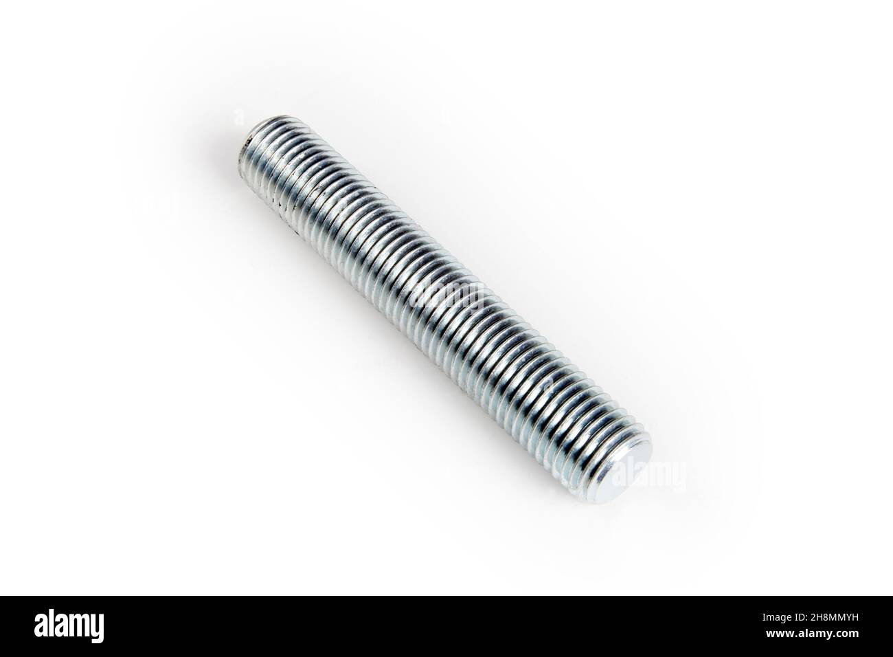 big metal screw on a white background Stock Photo - Alamy
