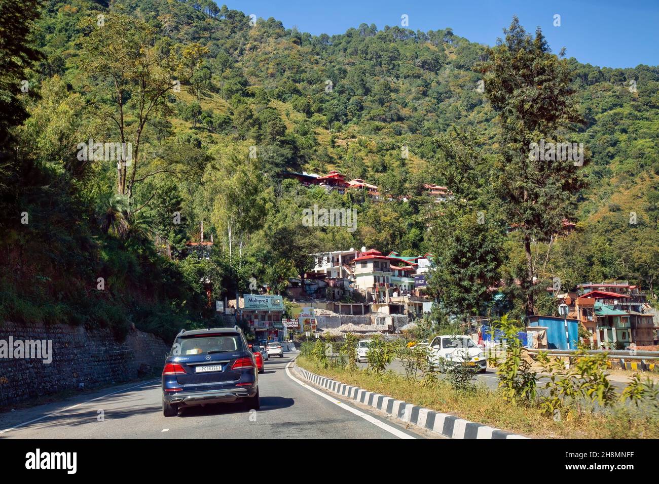 Tourist vehicles on Shimla Kinnaur highway road with scenic Himalaya ...