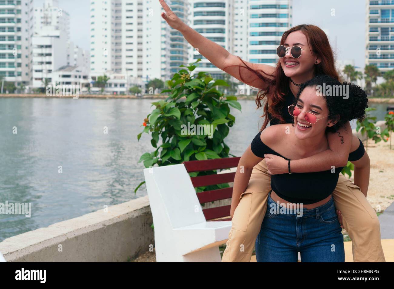 Two friends having fun together Stock Photo - Alamy