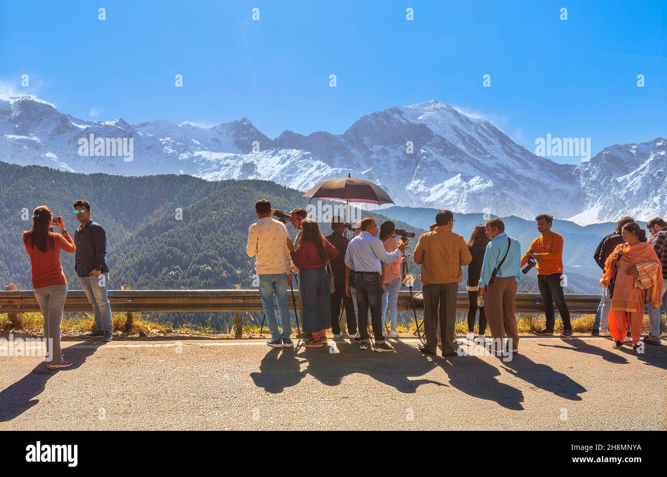 Tourist enjoy scenic Kinnaur Kailash Himalaya mountain range from view ...