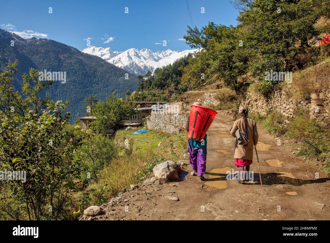 Scenic mountain landscape with unpaved village road with Kinnaur ...
