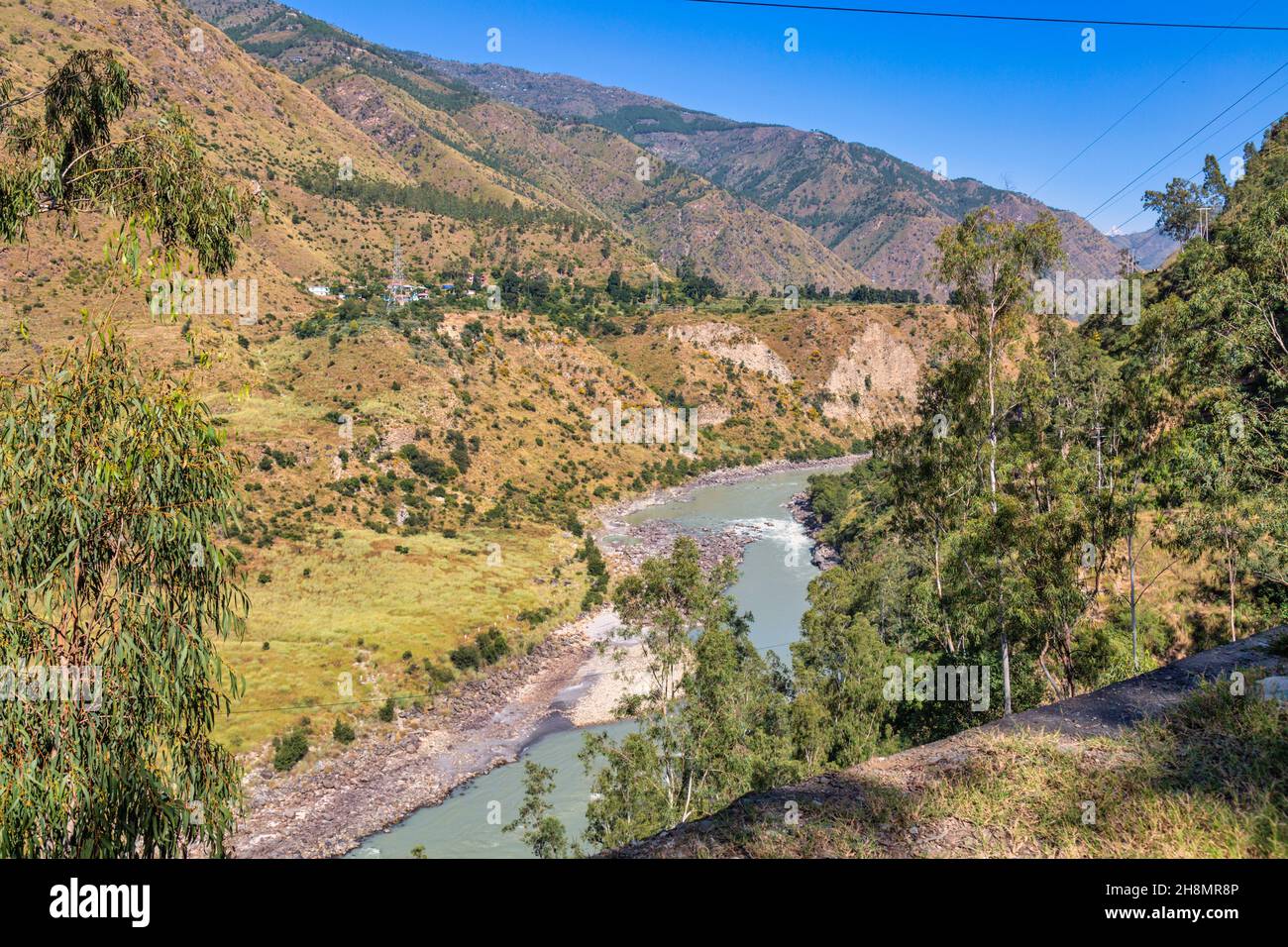 Aerial view of river Sutluj flowing through the scenic hill station of ...