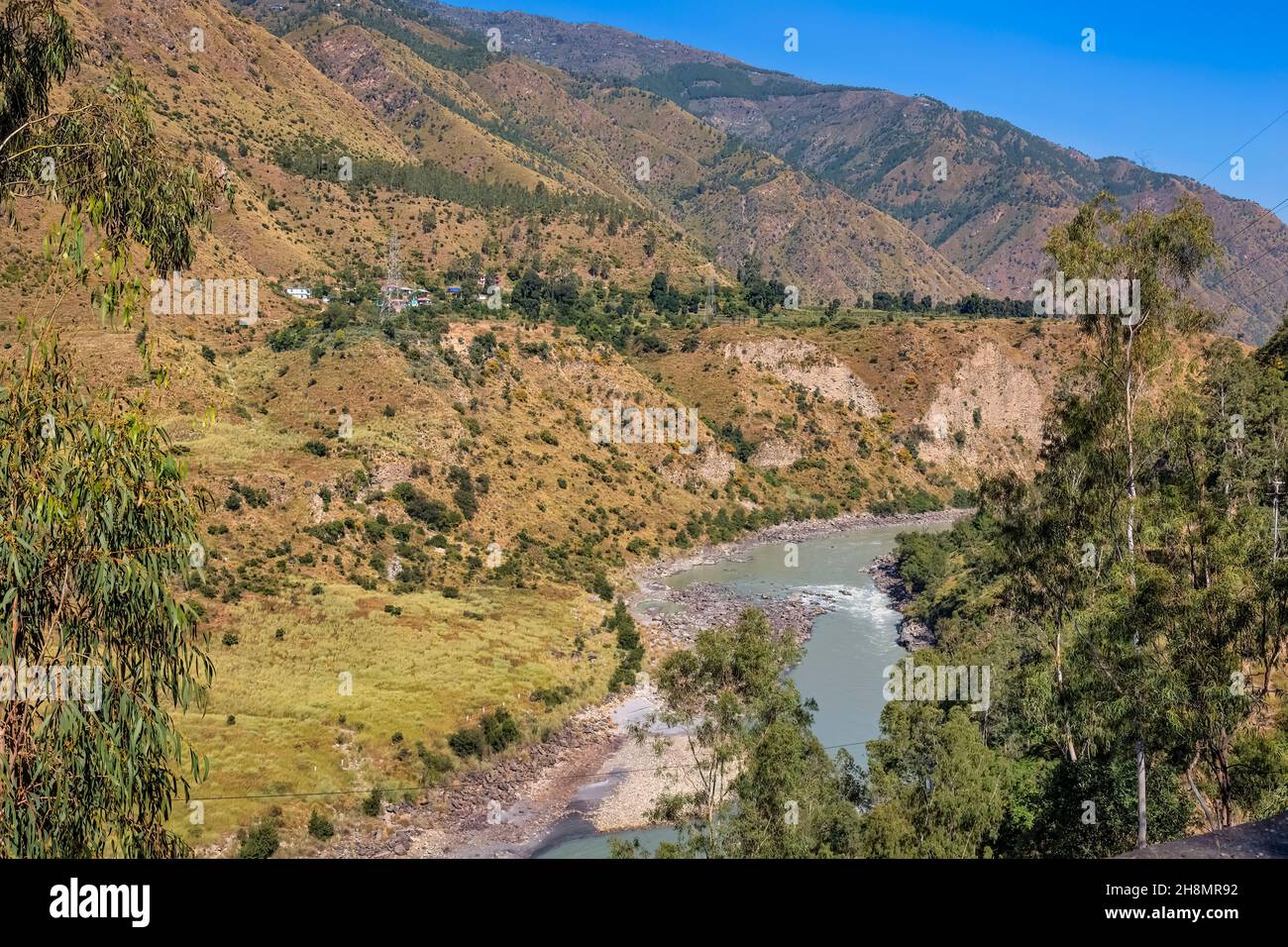 Aerial view of river Sutluj flowing through the scenic hill station of ...