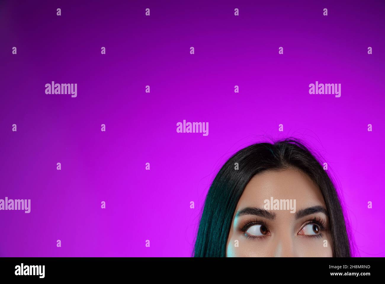 Cropped image of beautiful female eyes looking righ side isolated over ...