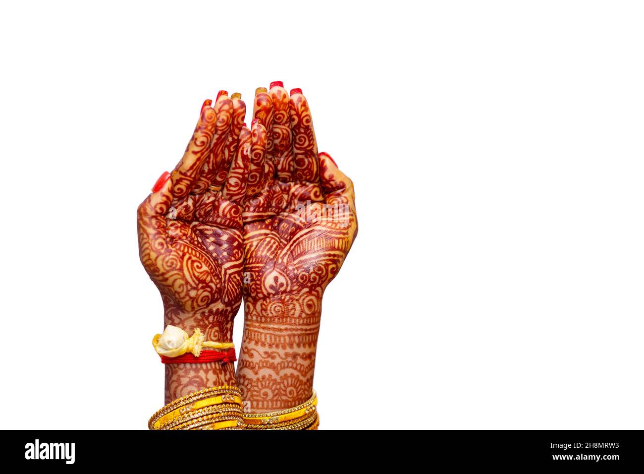 Indian Bride's hand painted with mehndi isolated on white background ...