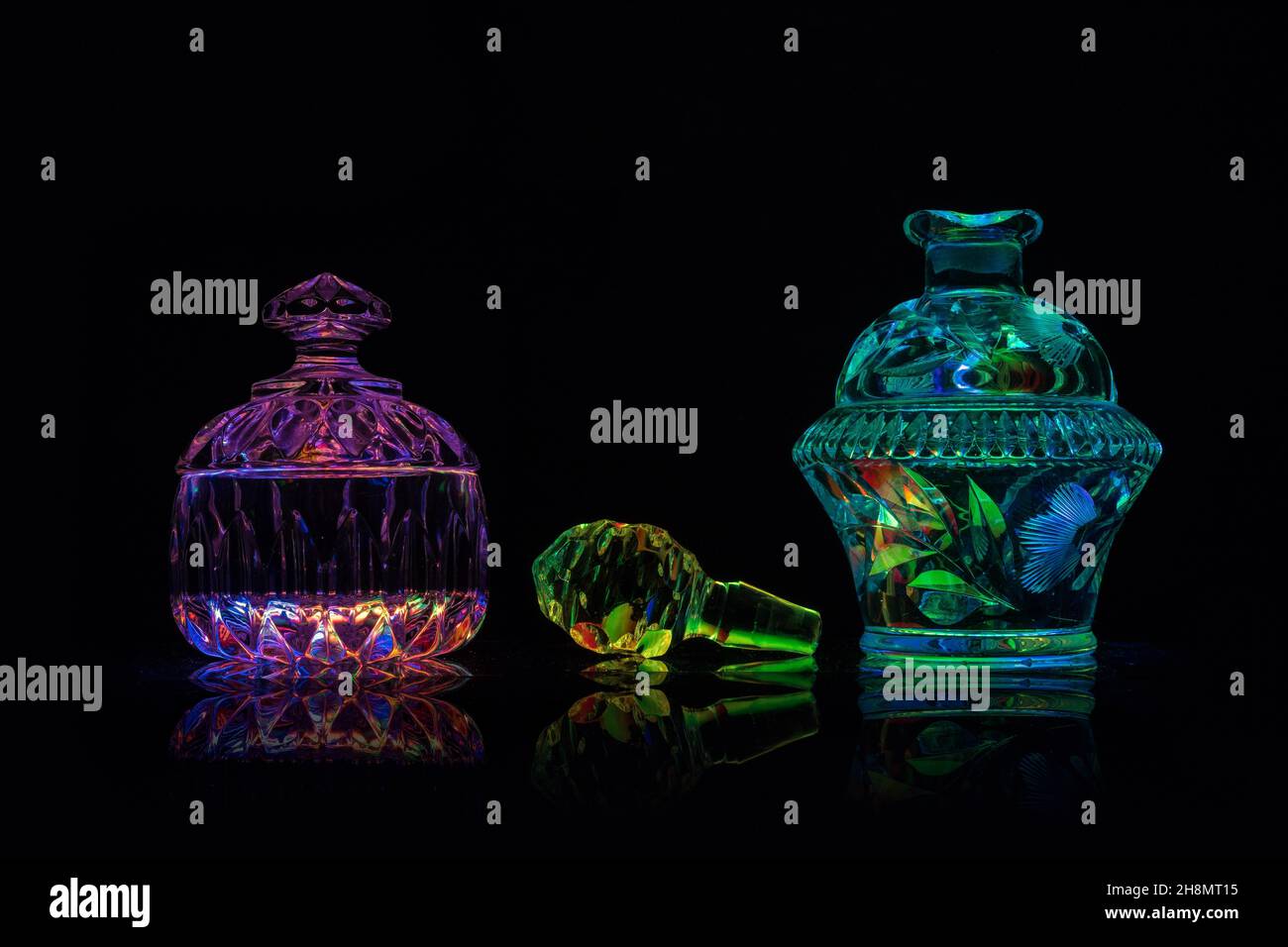 Still Life with Coloured Illuminated Crystal Glass Stock Photo - Alamy