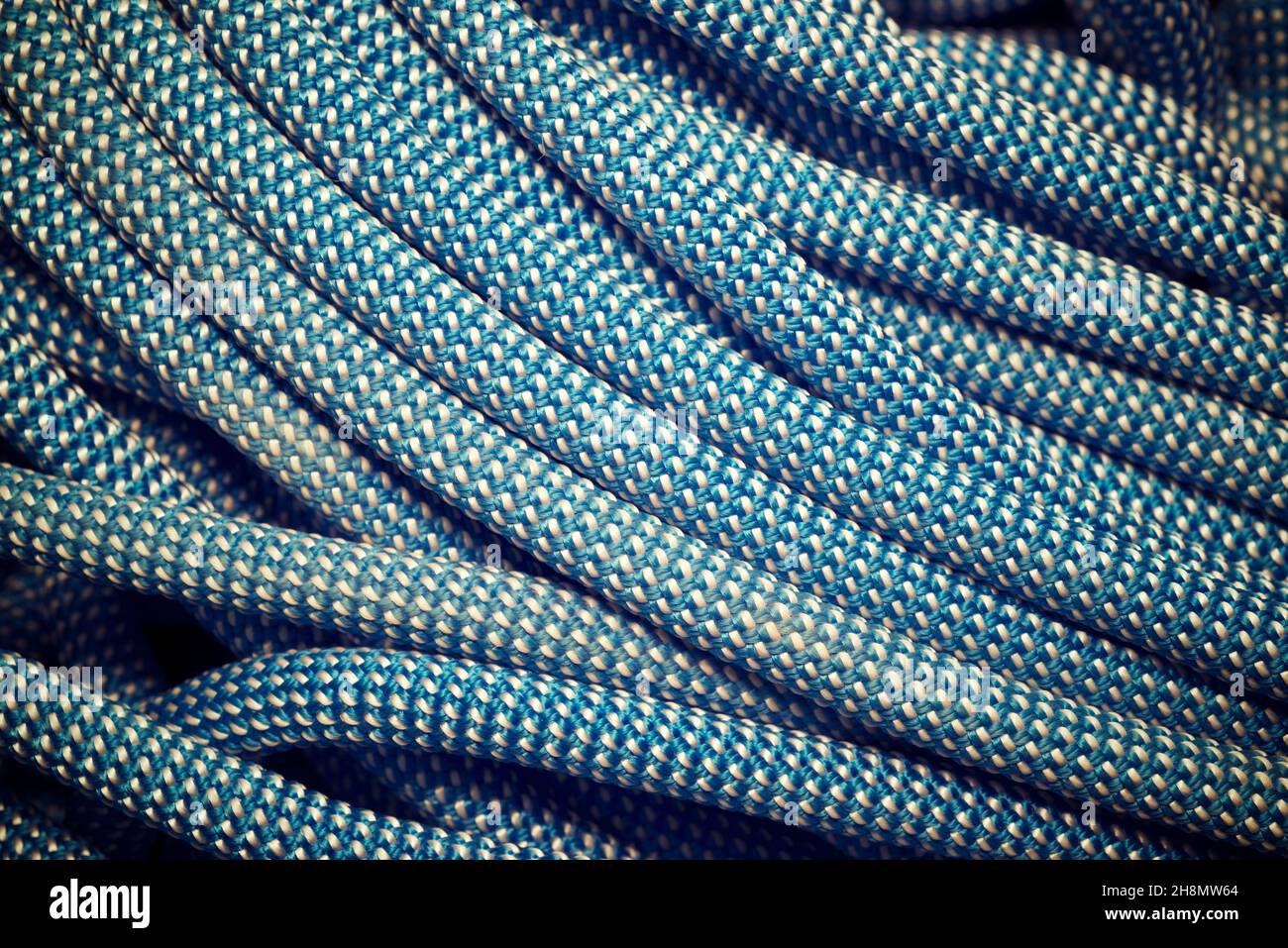 Blue climbing rope close up Stock Photo - Alamy