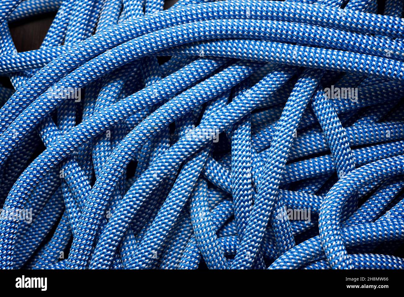 Blue climbing rope close up Stock Photo - Alamy