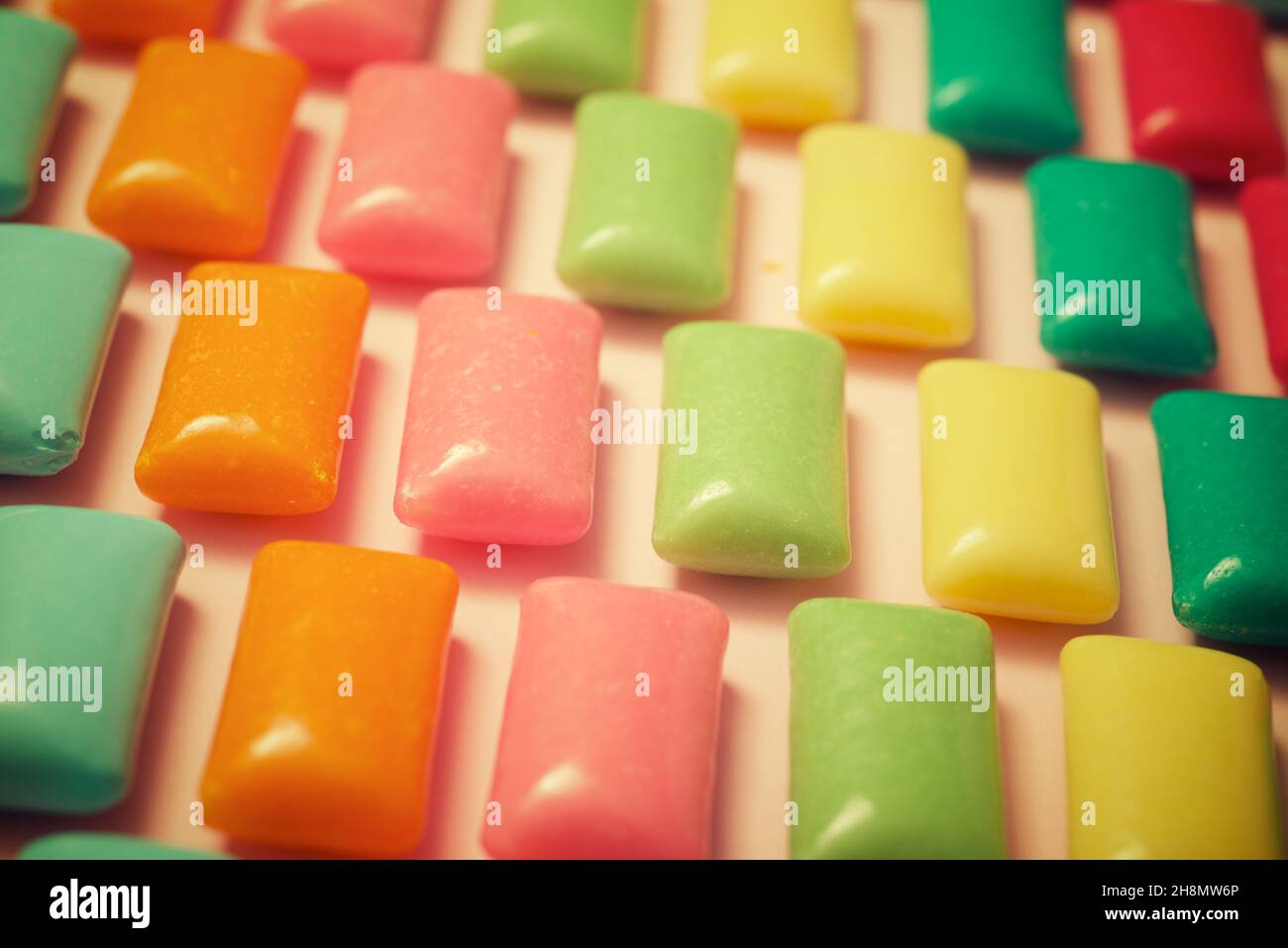 Chewing gum aligned on a table Stock Photo - Alamy