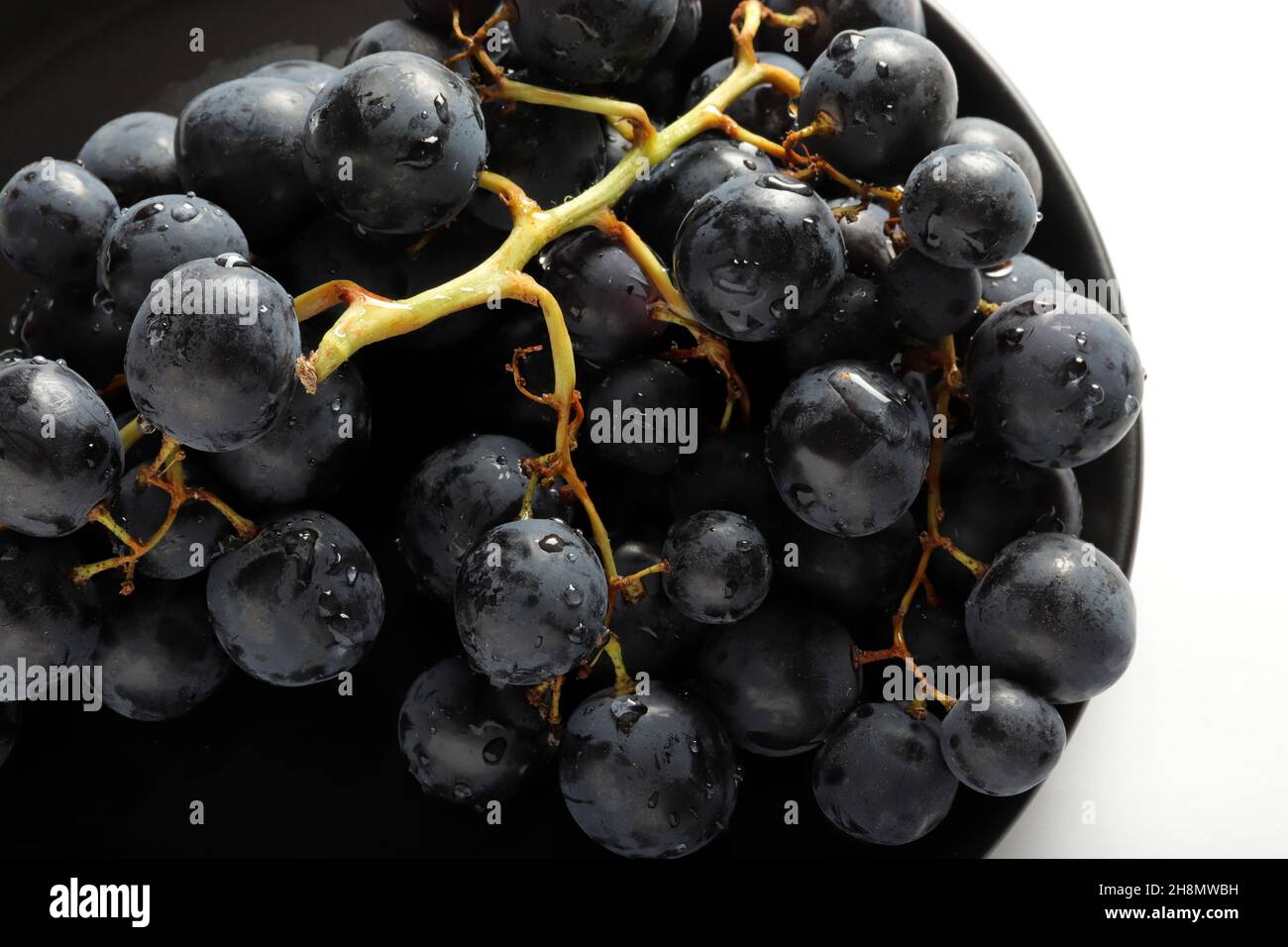Fresh dark red grapes close up Stock Photo - Alamy