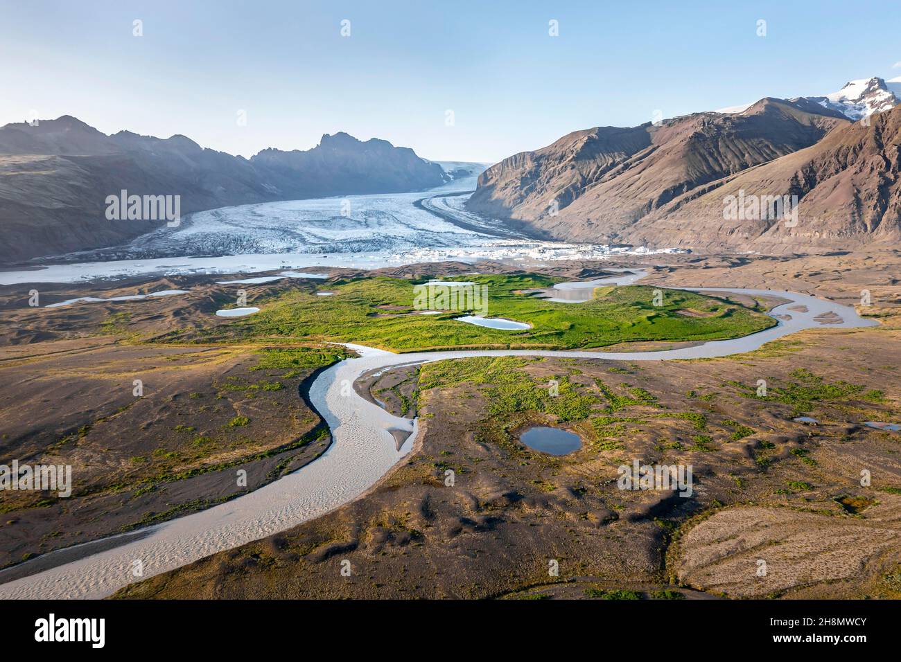 Glacier river in front of Mountains, aerial view, Skaftafell and ...