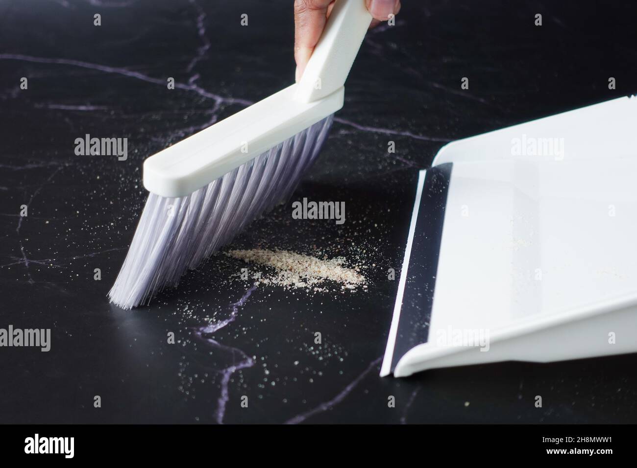 floor dust with dust pan close up Stock Photo - Alamy