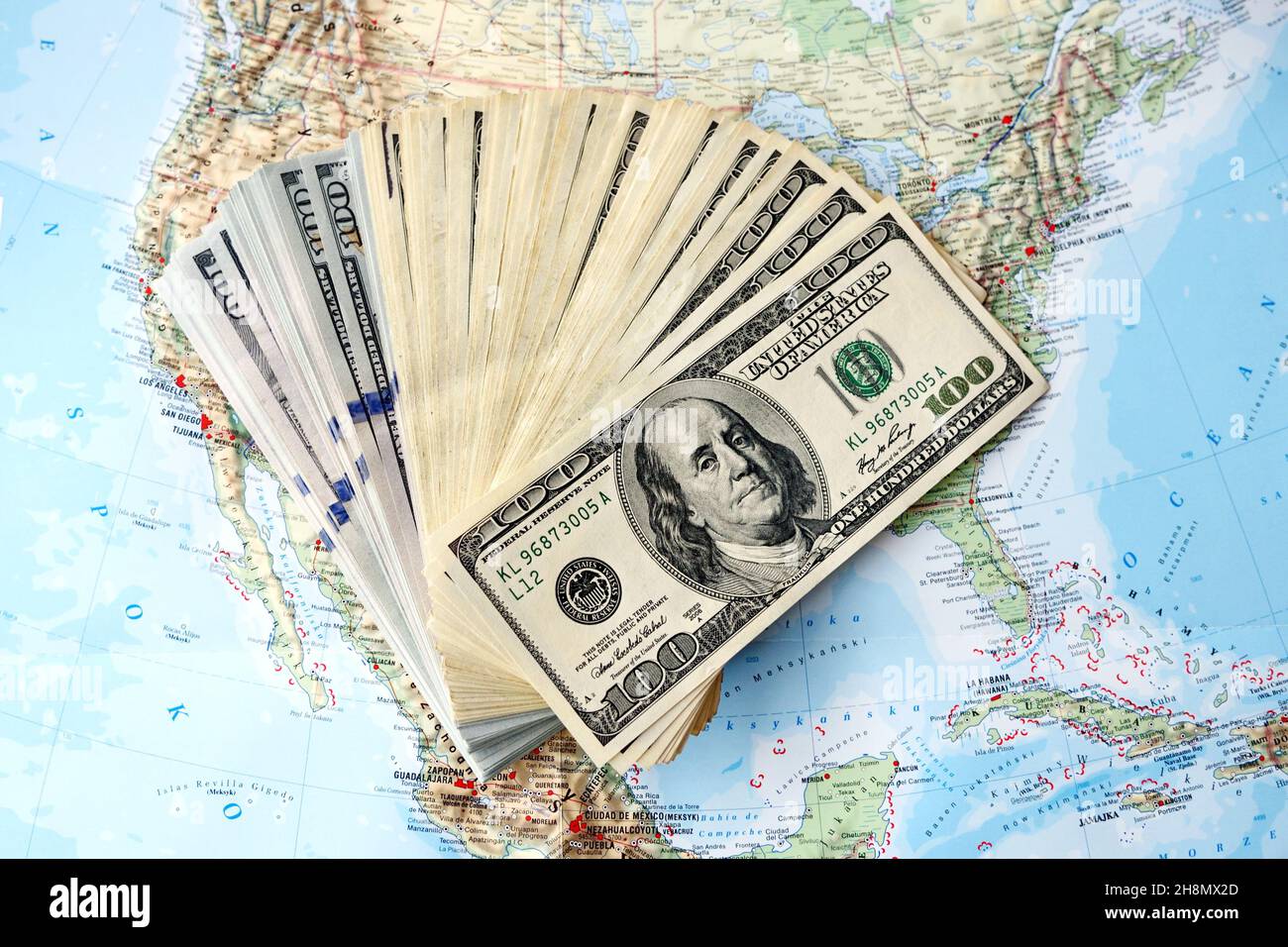Map of North America and banknotes. American dollars with map as ...