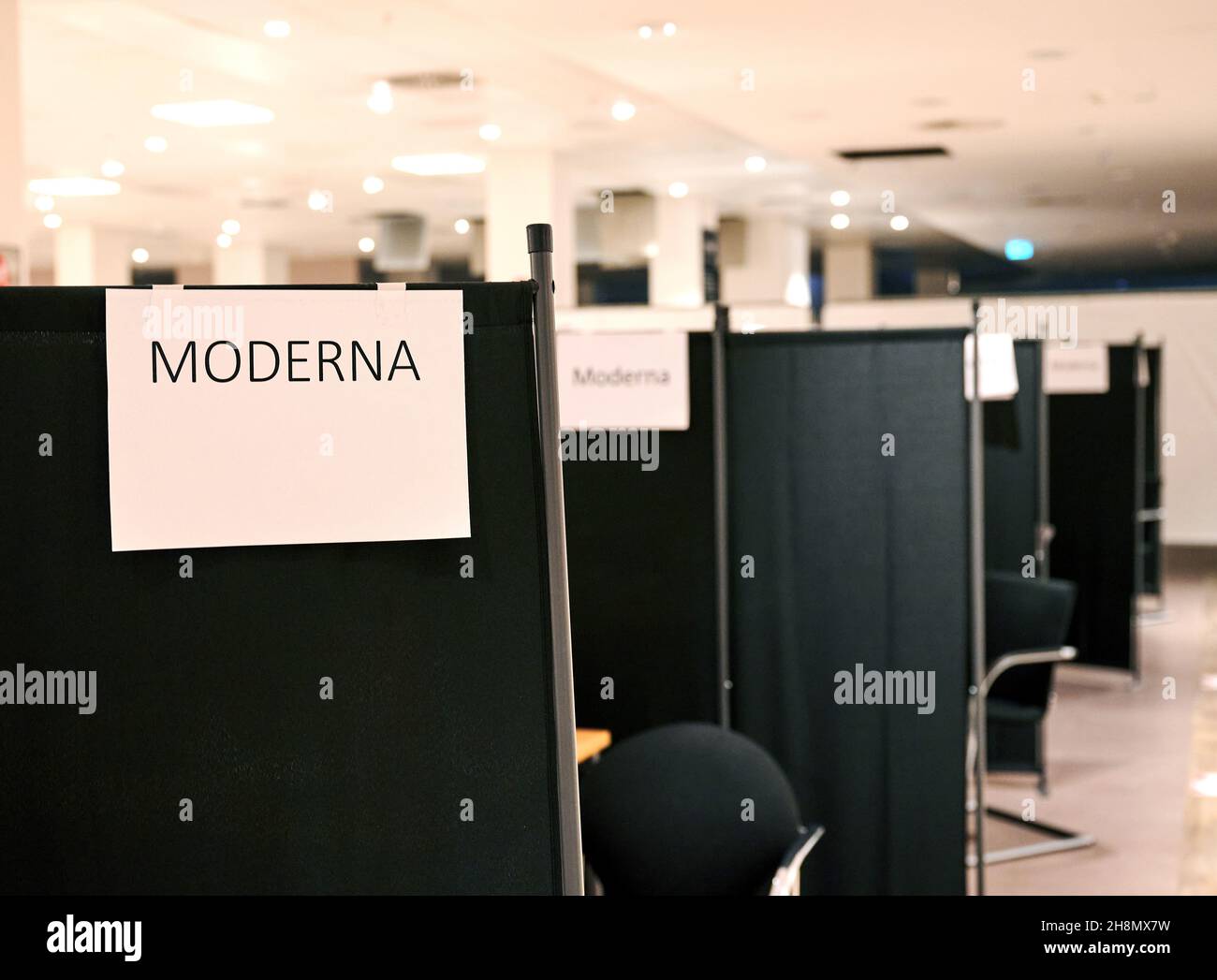 Berlin, Germany. 01st Dec, 2021. "Moderna" is written on the signs in ...
