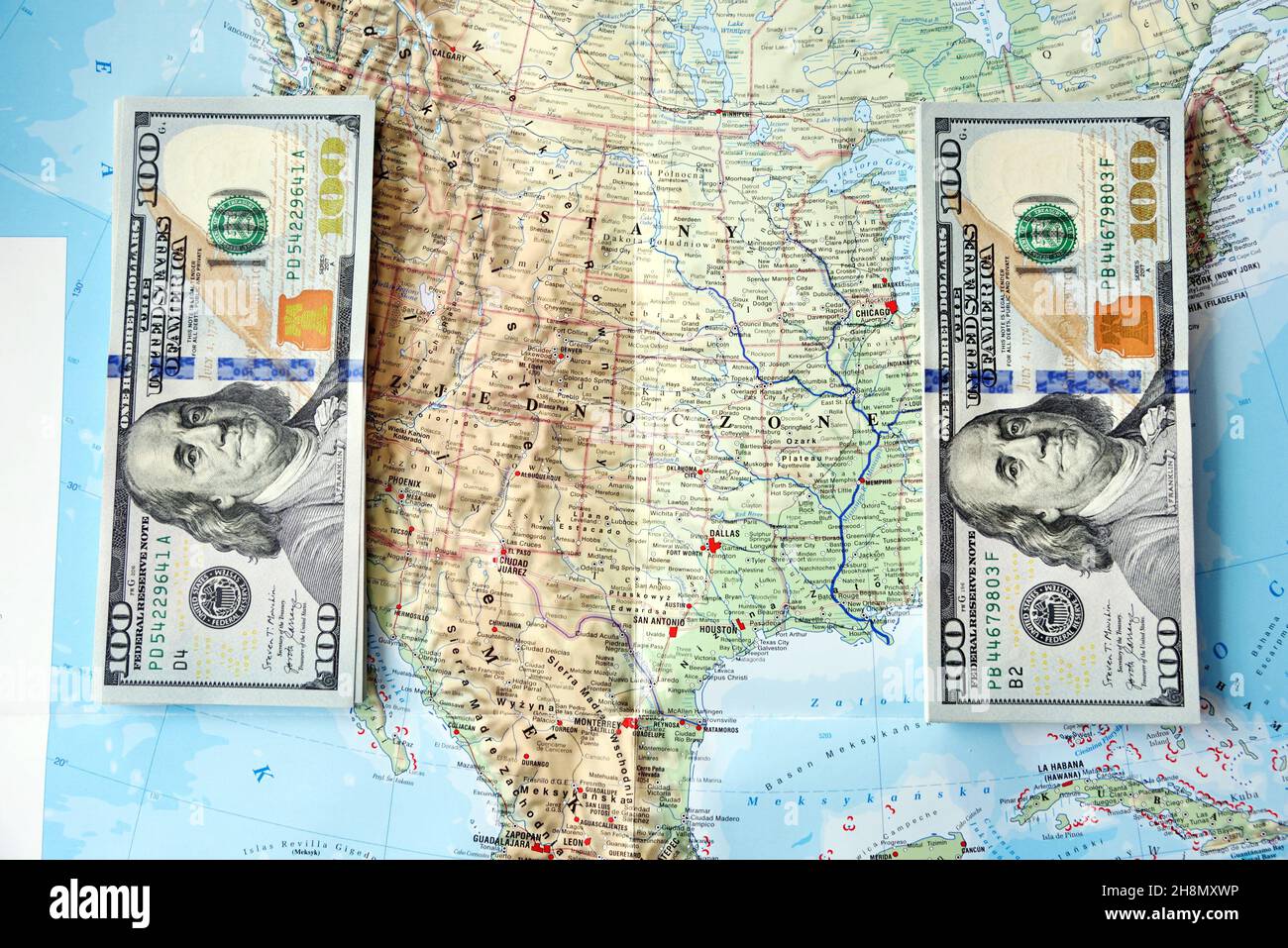 Map of North America and banknotes. American dollars with map as ...