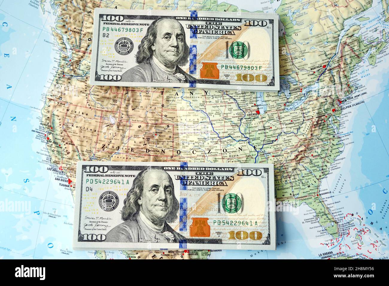 Map of North America and banknotes. American dollars with map as ...