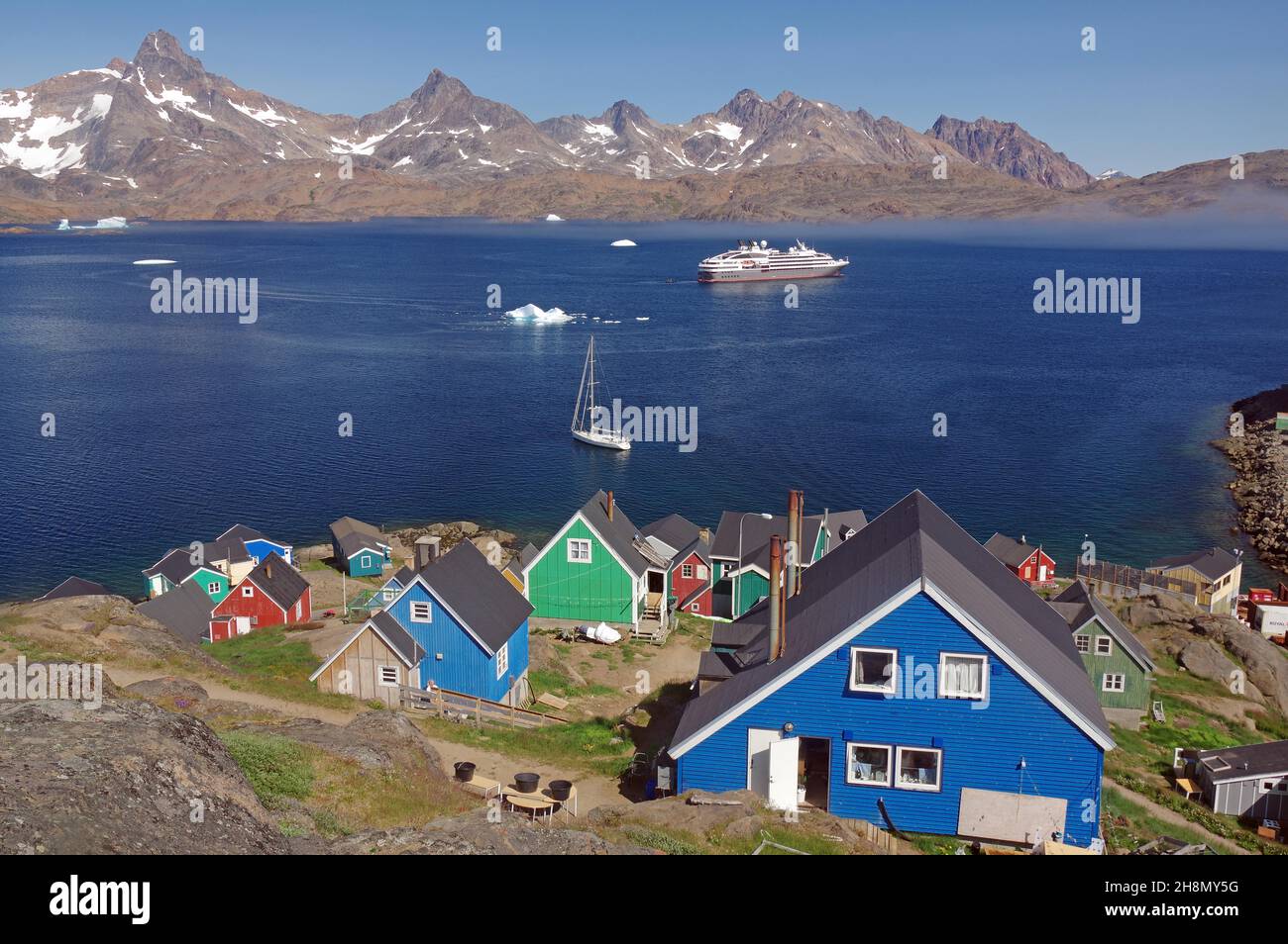 Houses, cruise ship in fjord, Tasilaq, Arctic, East Greenland ...