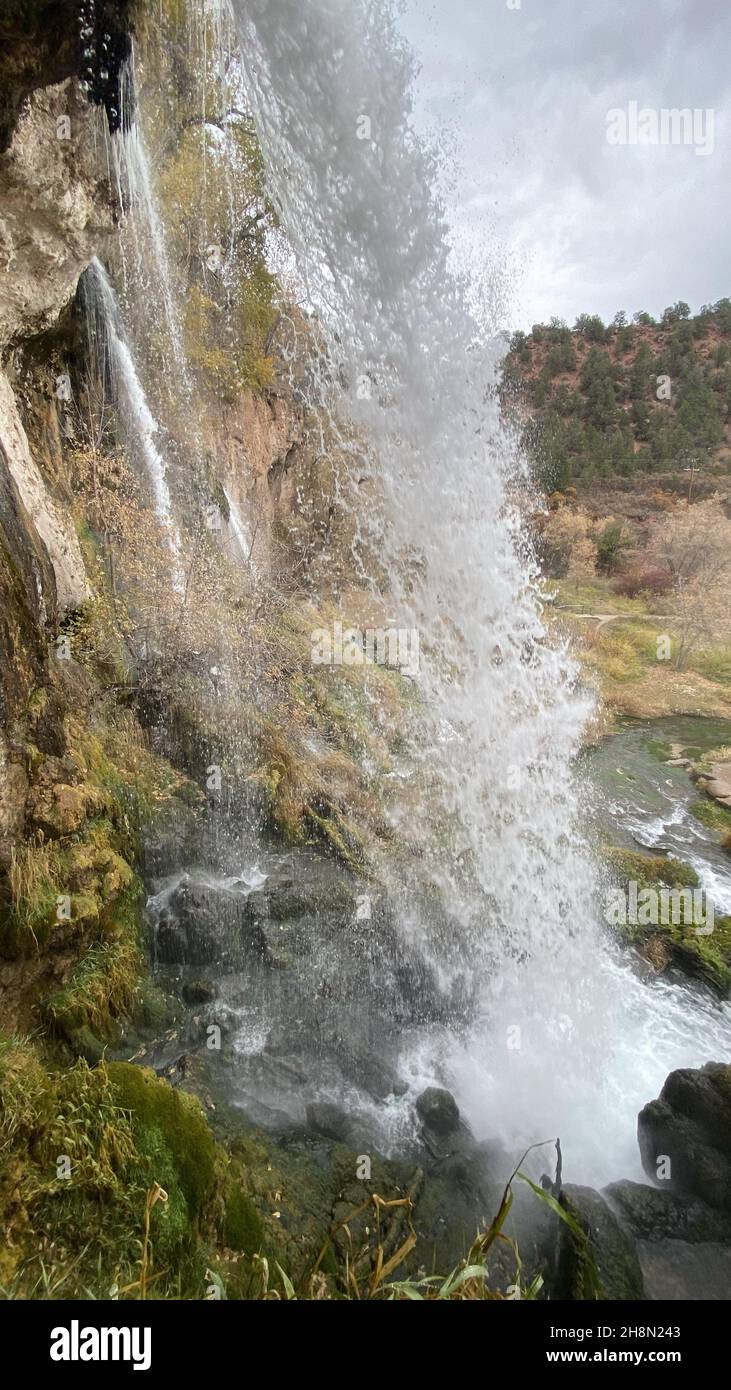 Beautiful shot of a huge waterfall in the Rifle Falls State Park on a ...