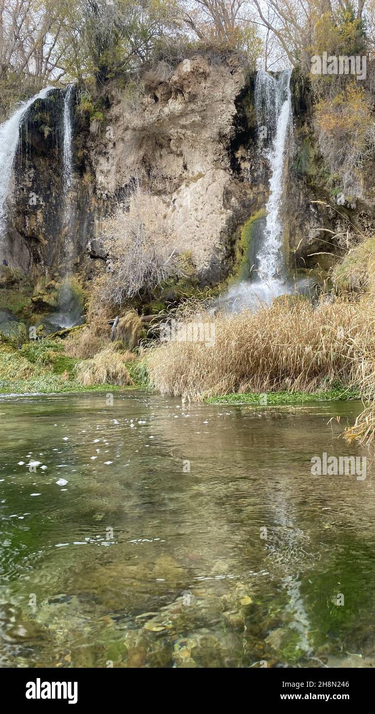 Beautiful shot of huge waterfalls in the Rifle Falls State Park on a ...