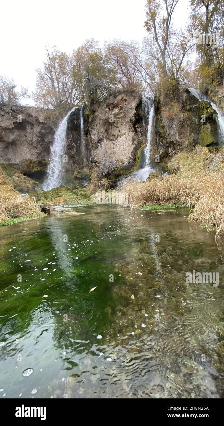 Beautiful shot of huge waterfalls in the Rifle Falls State Park on a ...